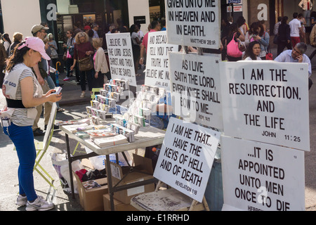 Members of the Blessed Hope Baptist Church pass out brochures as they ...
