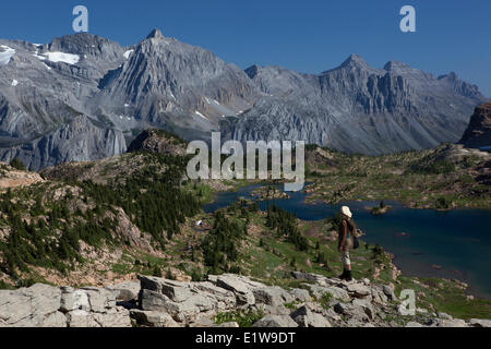 Hiker above Limestone Lakes Mount Marconi Mount Minton Russell Peak ...