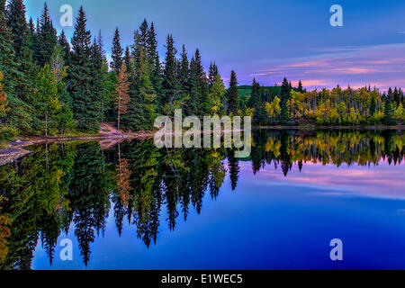 Sibbald Lake as seen in the fall at sunrise. Nice reflections of the ...