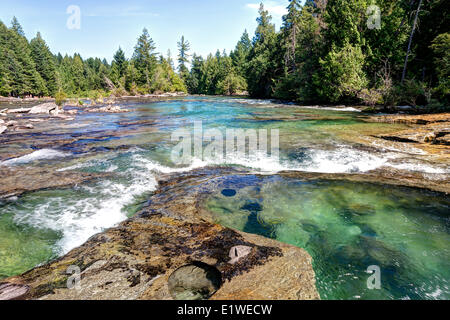 Sandstone potholes near Nymph Falls a popular swimming area on the ...