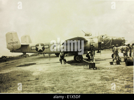 World War II, An American B-25 bomber flying over the Japanese ...