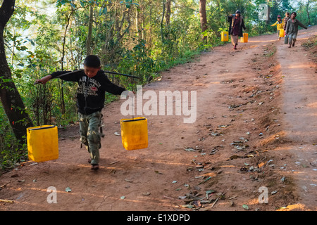 Boy fetching water, Kalaw, Myanmar, Asia Stock Photo - Alamy