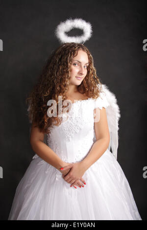 Portrait of an angel with brown eyes and hair Stock Photo - Alamy