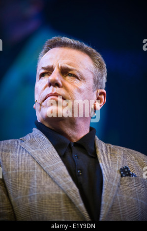 Suggs talking about his early life and years as a musician on stage at ...