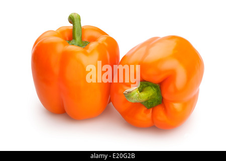 Two orange bell peppers isolated on white background Stock Photo - Alamy