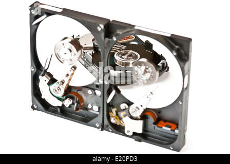 Spinning hard drive disks and writing head macro photo illuminated from ...