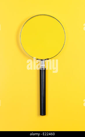 Magnifier with handle close-up on a white background Stock Photo - Alamy