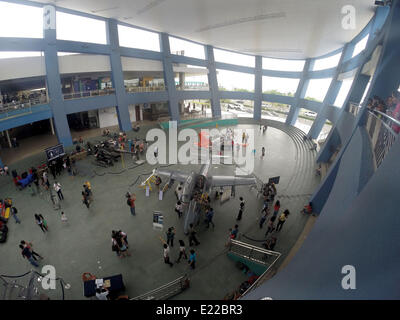 Pasay City, Philippines. 13th June, 2014. A girl plays inside the ...