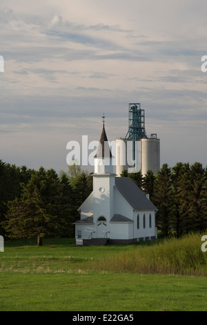 Maddock, North Dakota - A rural church and a grain elevator Stock Photo - Alamy