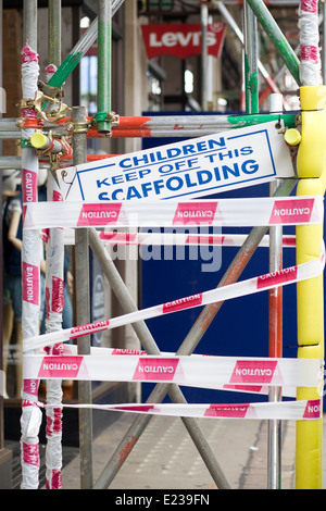 children keep off this scaffolding warning sign on building site in ...