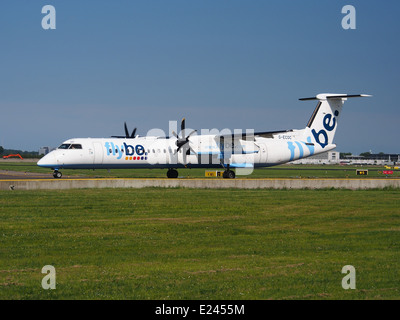 G-ECOC, a Flybe De Havilland Canada DHC-8-402Q Dash 8, taxiing on the tarmac at Schiphol Airport ...