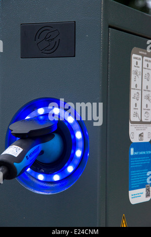 electric car loading energy at a public charging system in the Hague ...