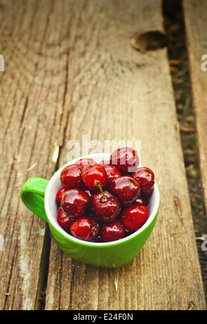 Sweet ripe bird cherry in the basket Stock Photo - Alamy