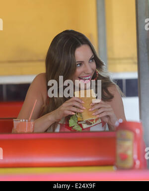 Kelly Brook films a commercial on location in Miami Beach. During the ...