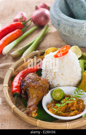 Indonesian fried chicken rice Stock Photo - Alamy