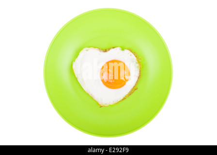 Scrambled in a heart shape on a plate Stock Photo - Alamy
