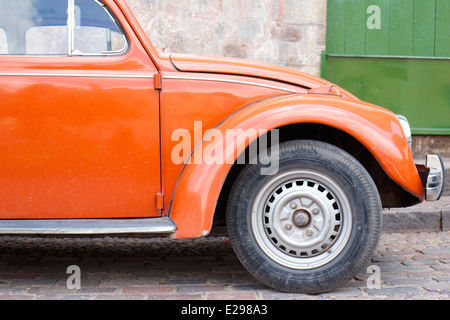 A pretty street scene with a VW Bug Cusco, Peru, the ancient seat of ...