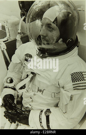 Apollo 13 astronauts John Swigert Jr., with his arms upraise and James ...
