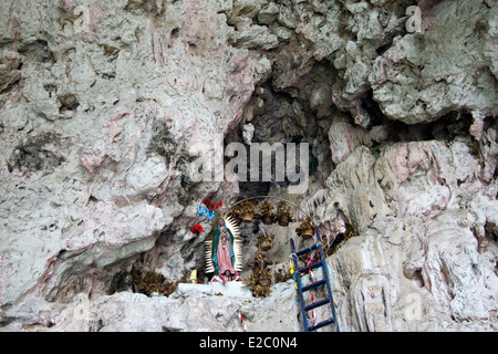 An altar to Our Lady of Guadalupe in a cave in the Sumidero Canyon in ...