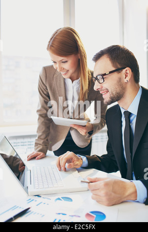 Two successful business partners working at meeting in office Stock ...