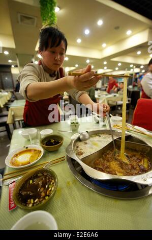 China, Hebei province, Chengde, restaurant of Chinese fondue Stock ...