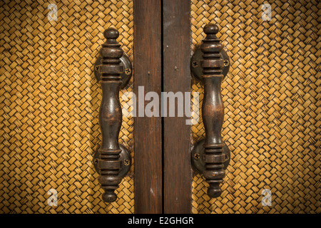 Wood Door handles and bamboo stick cross Stock Photo - Alamy
