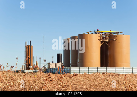 An oil storage tank battery and separating equipment on an oil well location in Utah Stock Photo ...