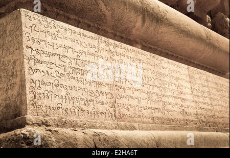 Indian inscriptions carved into a temple wall, Brihadeeswarar Temple ...