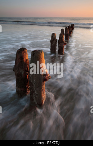 Groynes and surf at Sandsend near Whitby in North Yorkshire, England ...