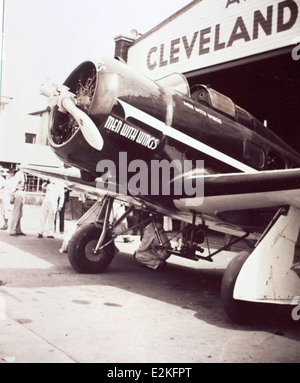 Paul Mantz, a renowned aviation pioneer and stunt pilot, is captured in ...