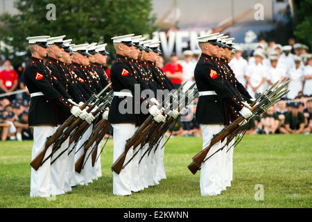 The U.S. Marine Corps Silent Drill Platoon performs during the sunset ...