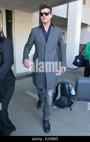 Singer Robin Thicke arrive at LAX Airport Featuring: Robin Thicke Where ...