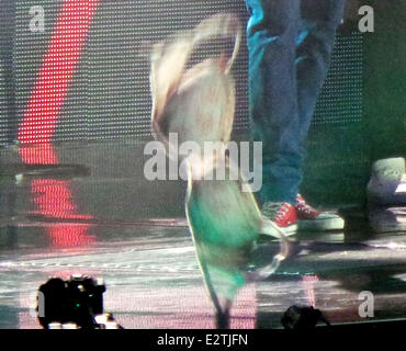 A bra is thrown towards Harry Styles of One Direction during the second ...