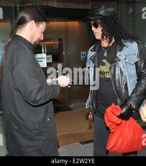 Guitarist Slash is seen greeting fans outside the Morrison Hotel in ...