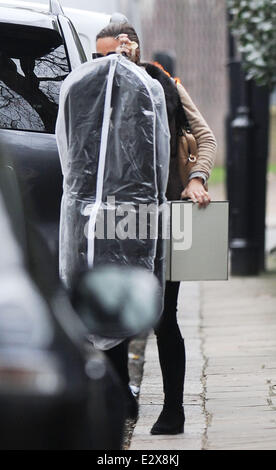 Pippa Middleton plays hide and seek with the photographers by hiding ...