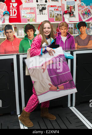 Fans of One Direction attending the opening of 1D World, a 'Pop Up ...