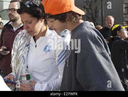 Lisa Ahern and her son Ben anxiously wait for news from her husband ...