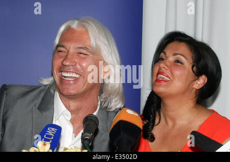 Dmitri Hvorostovsky and Anna Netrebko attend a press conference at ...