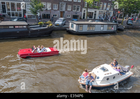 Vintage Amphicar 770 in an Amsterdam canal. Amphibious auto, water car ...