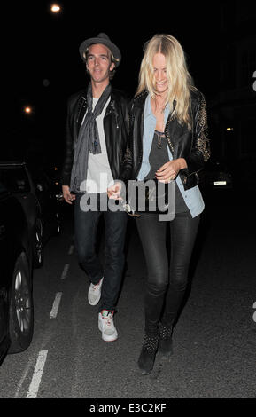 Poppy Delevingne arriving home with her long term boyfriend James Cook ...