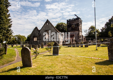 The burnt remains of St Peters Church in Ropley, Hampshire , England ...