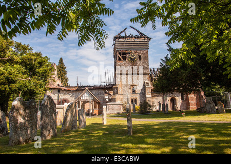 The burnt remains of St Peters Church in Ropley, Hampshire , England ...