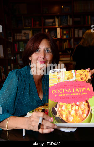 Bookstore owner and Cuban cookbook author Raquel Roque greets fans and ...