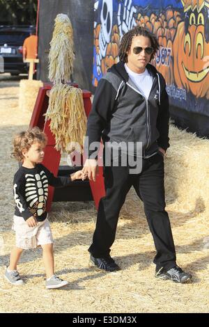 Cobi Jones and pregnant wife Kim Reese take their son to the Mr Bones ...