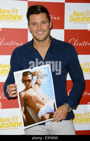 Mark Wright signs copies of his official 2014 calendar at Clintons at ...