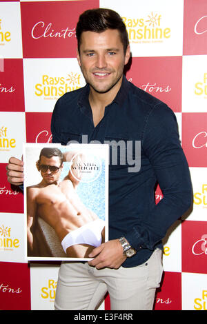 Mark Wright signs copies of his official 2014 calendar at Clintons at ...