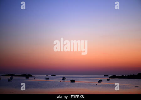 Sunset at Cobo Bay in Guernsey, channel islands Stock Photo - Alamy