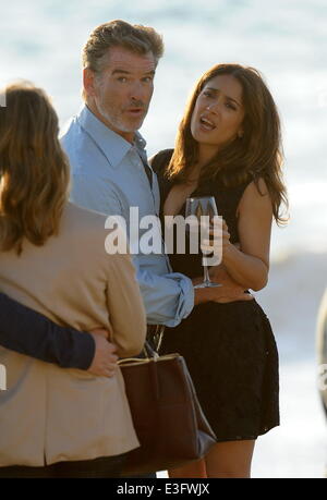 Salma Hayek and Pierce Brosnan filming a romantic kissing scene on the ...