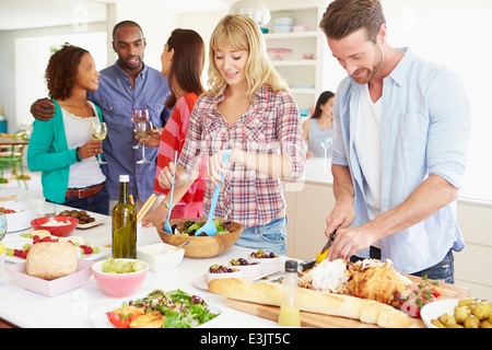 Group of young friends having party eating italian pizza and and ...