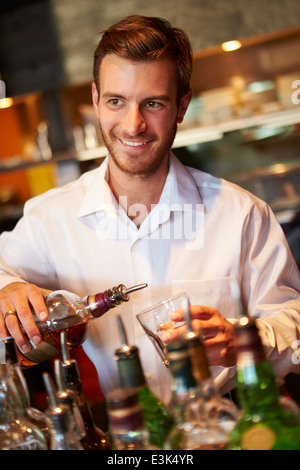 people at a busy bar in a nightclub Stock Photo - Alamy